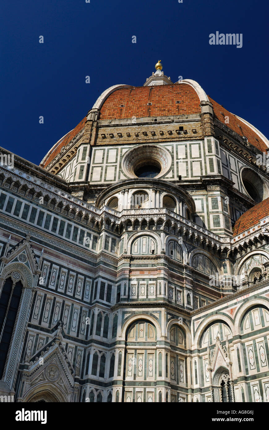 Red dome with blue sky Duomo Santa Maria del Fiori with bell tower of ...