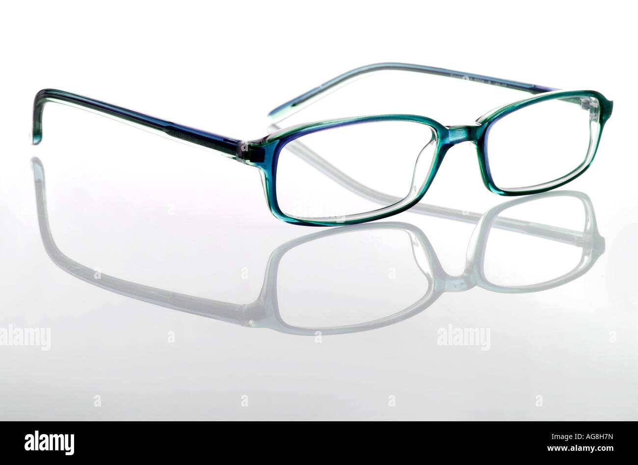 Glasses isolated in a white background with reflection Stock Photo - Alamy