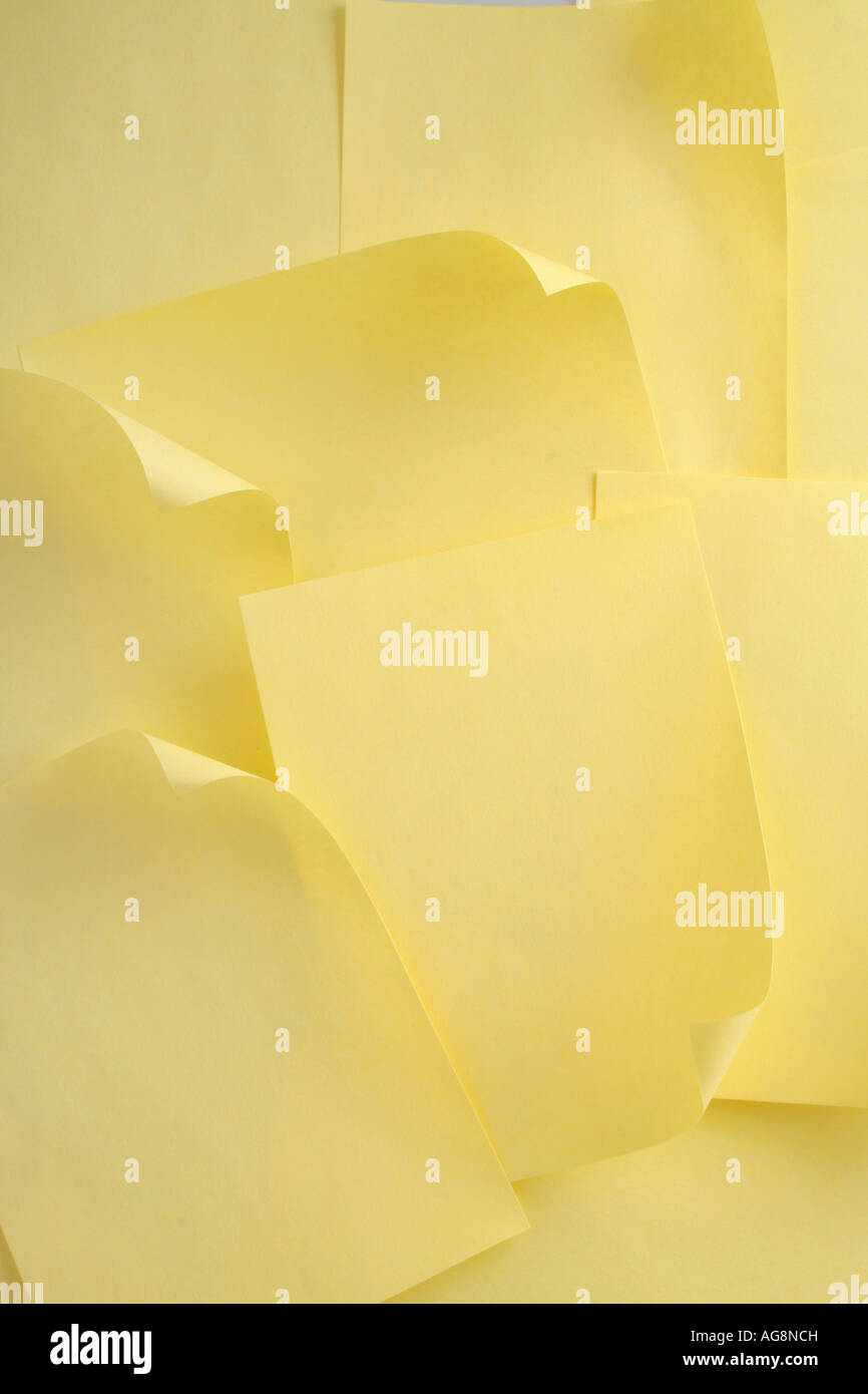 yellow paper on white background Stock Photo - Alamy