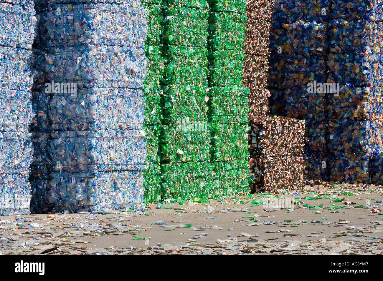 plastic bottles, sorted by colour, compressed into bales and ready for ...