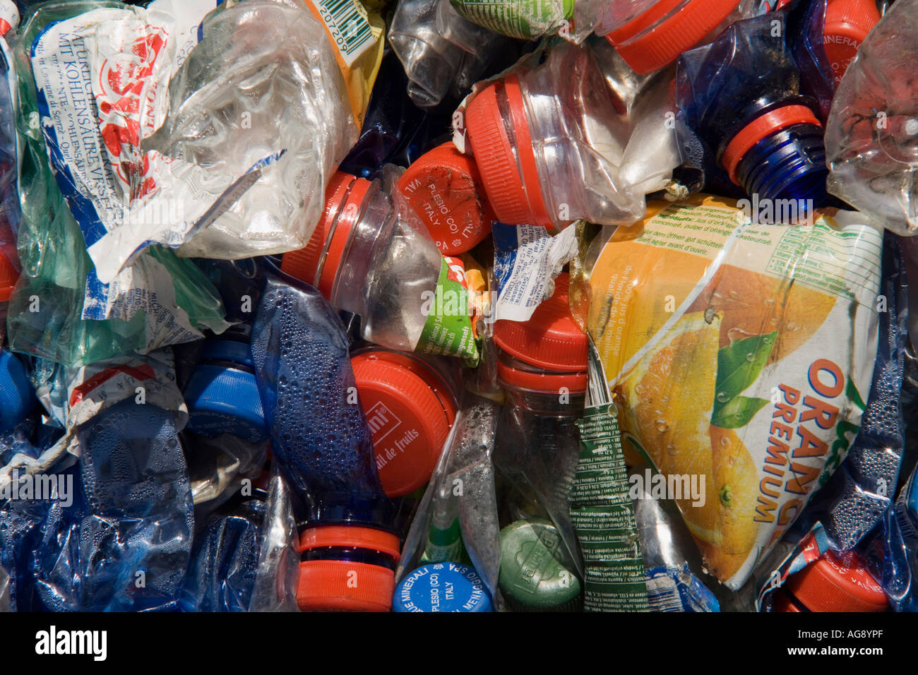 plastic bottles, compressed into a large bale and ready for recycling ...