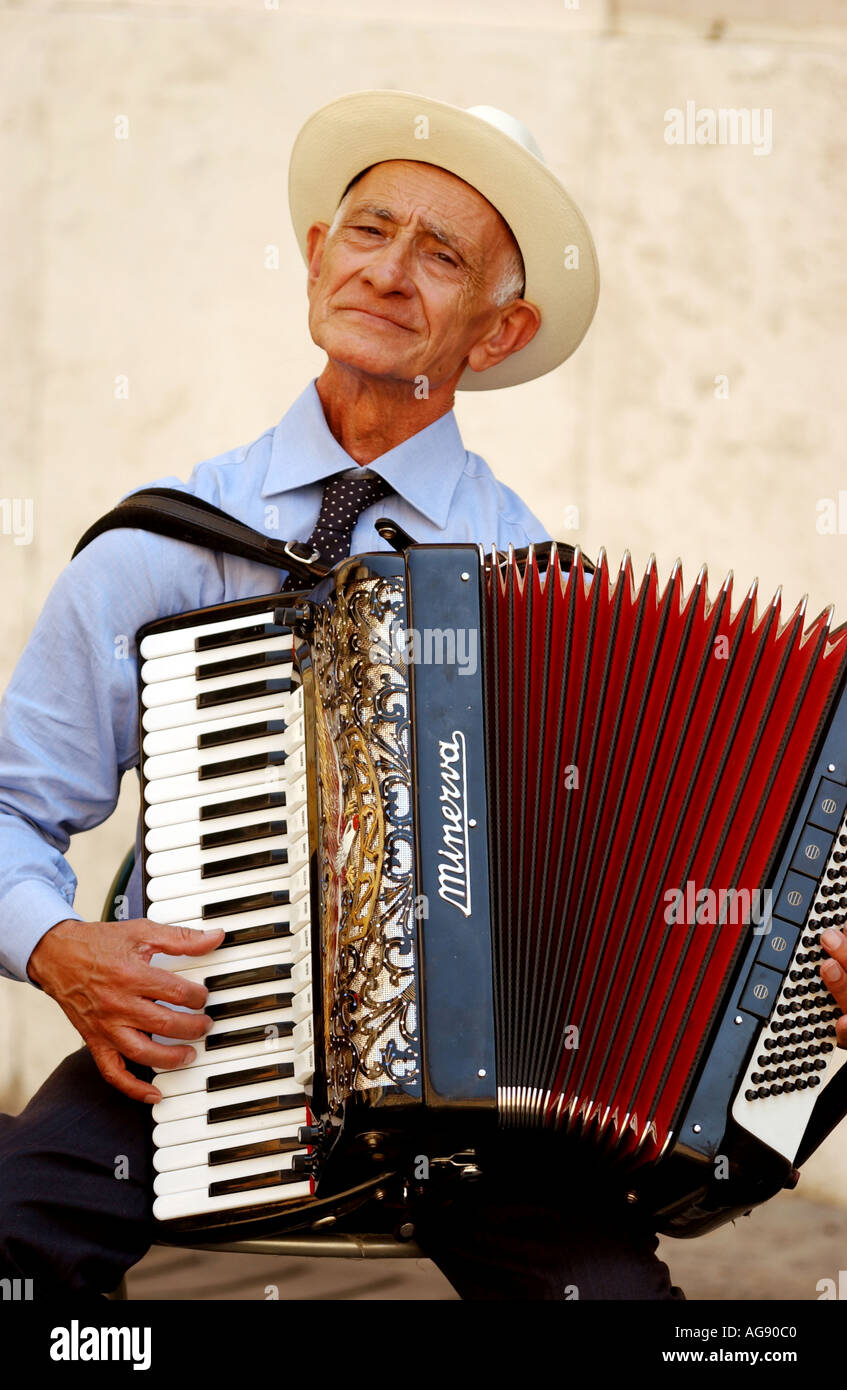 Man playing instruments hi-res stock photography and images - Alamy
