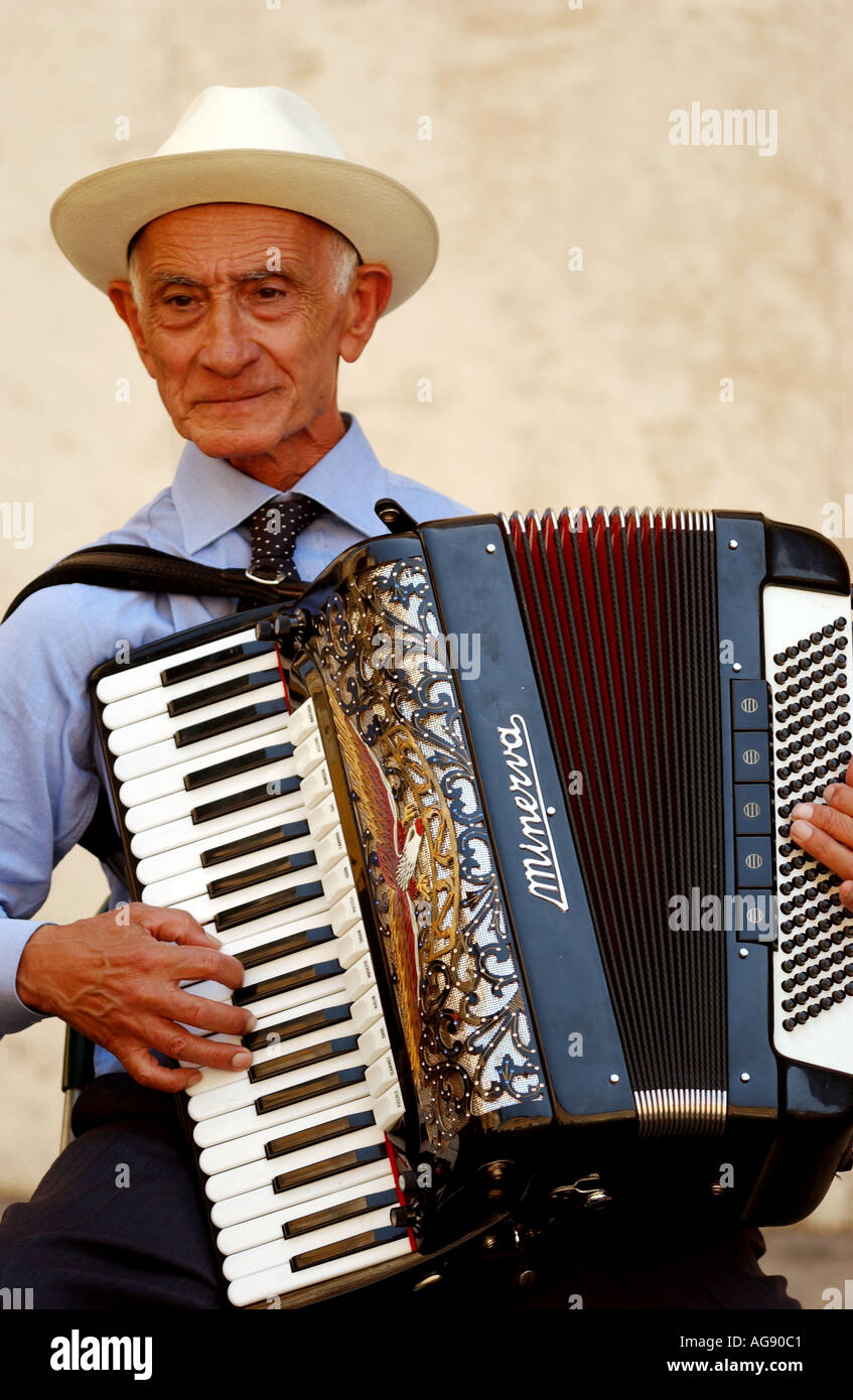 Man playing instruments hi-res stock photography and images - Alamy
