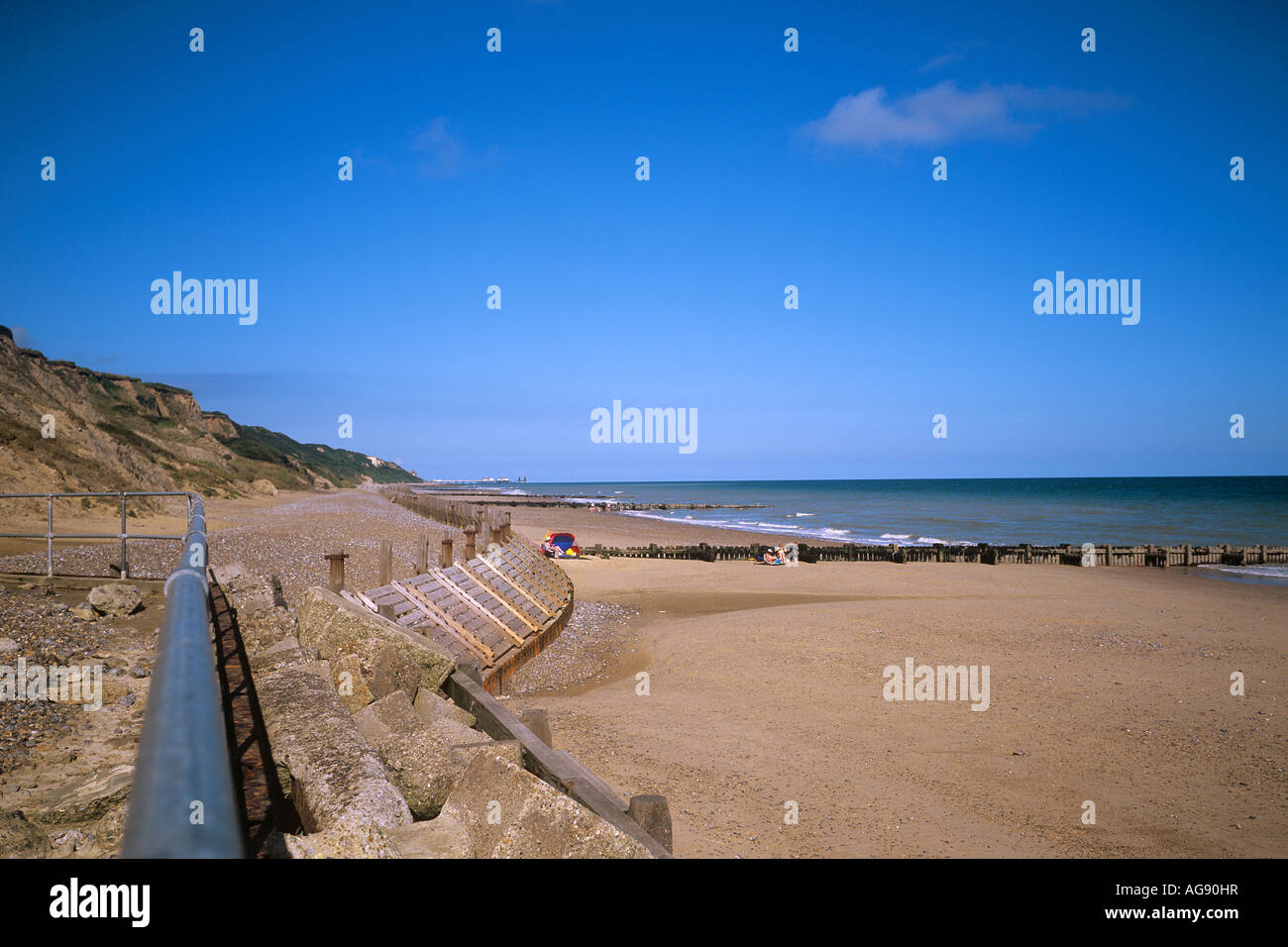 Groynes and sea defences below the unstable cliffs at Overstrand ...