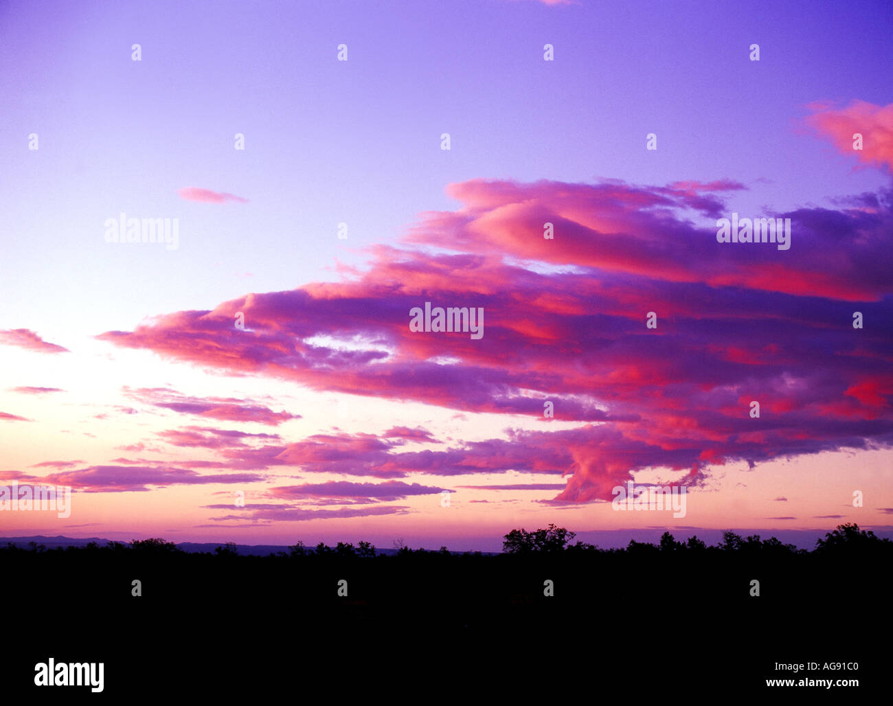 Sunsets with clouds hi-res stock photography and images - Alamy