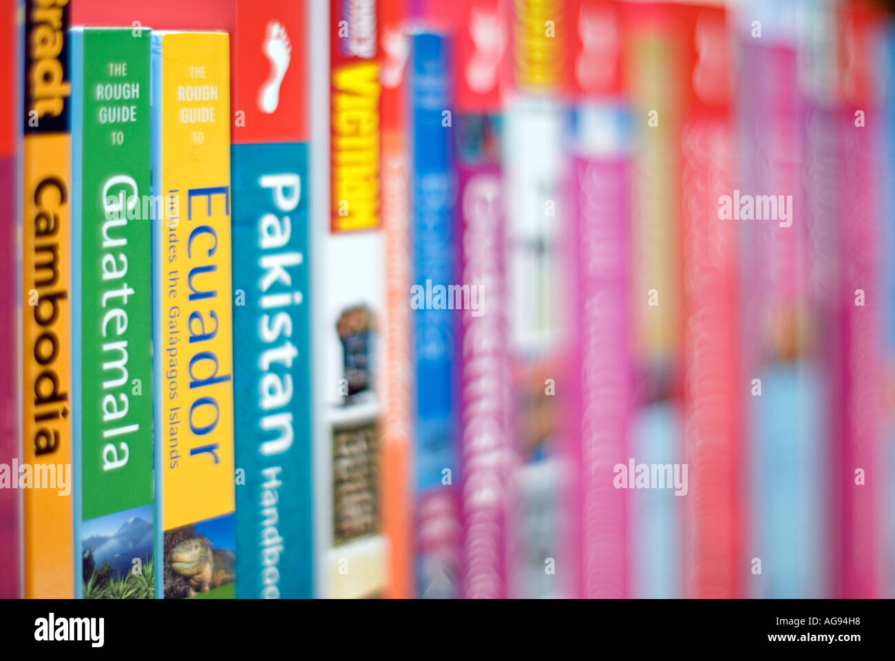 Selection of Travel Guide Books to various destinations on a shelf ...