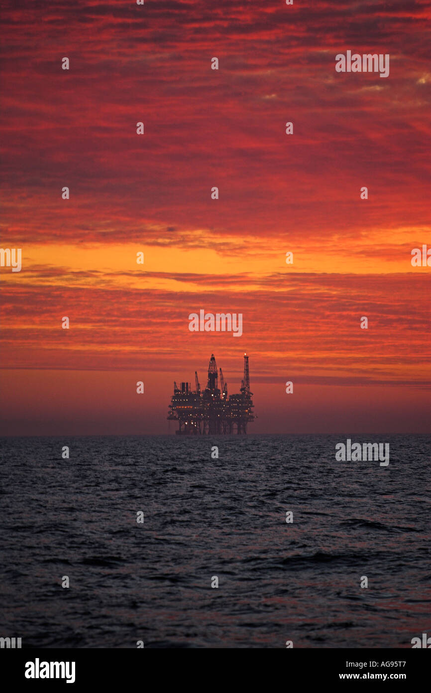 oil rig at sunset Stock Photo - Alamy