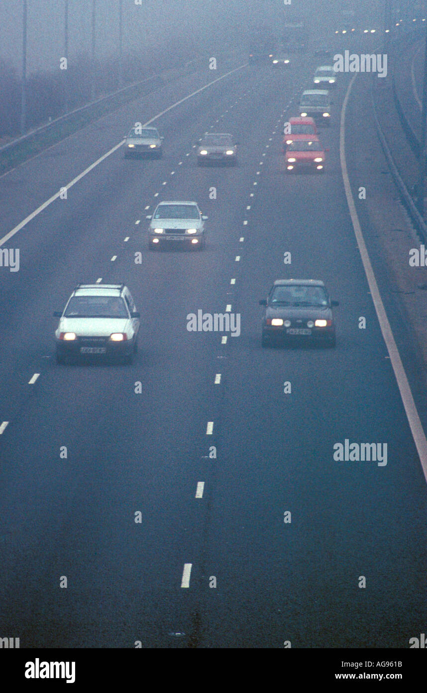 Traffic on M1 motorway in fog Northamptonshire England Stock Photo - Alamy