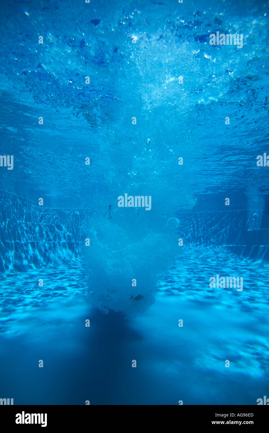 Diving Into Swimming Pool Stock Photo - Alamy