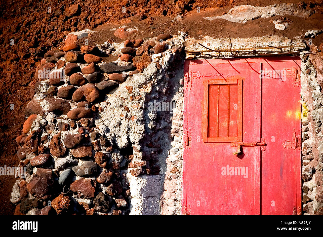 Red door of a hide Stock Photo - Alamy