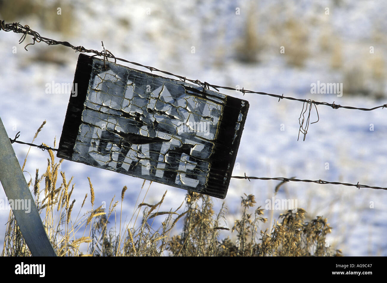 Close Gate sign hanging from barbed wire fence Yakima River Canyon ...