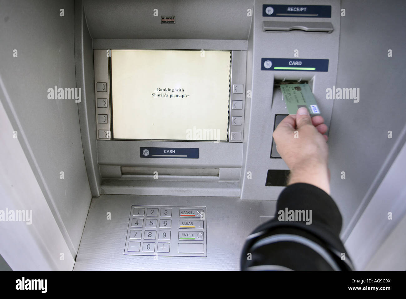Sharia whitechapel muslim atm hi-res stock photography and images - Alamy