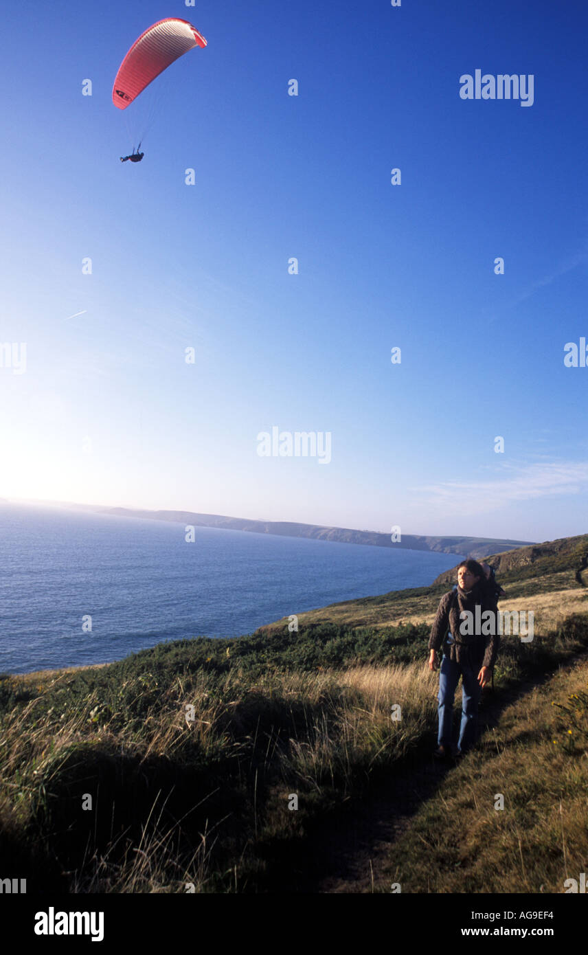 Walker on coastal path Paraglider Pembrokeshire Wales UK 43093AD Stock ...