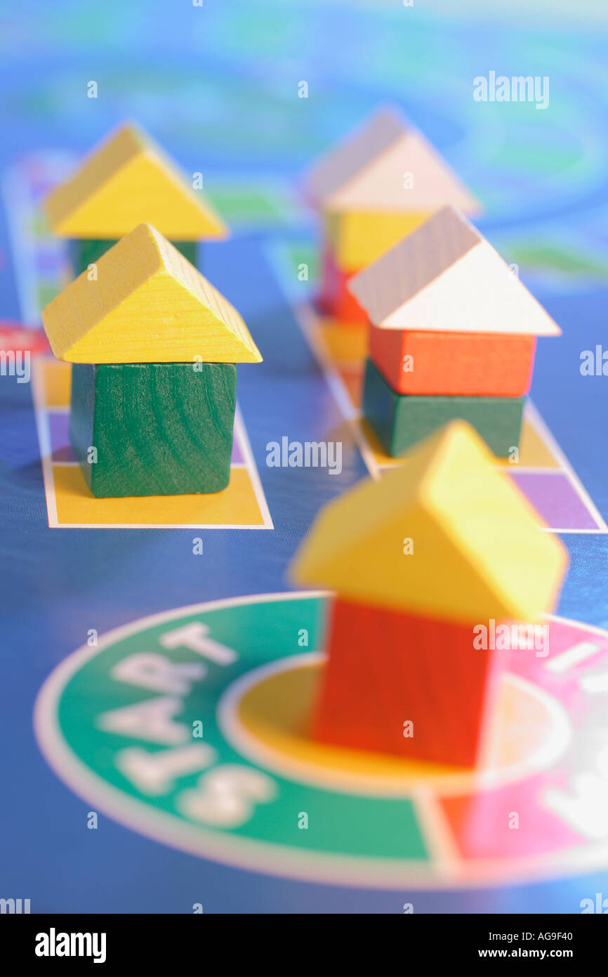 Wooden House Symbols on Board Game Stock Photo - Alamy