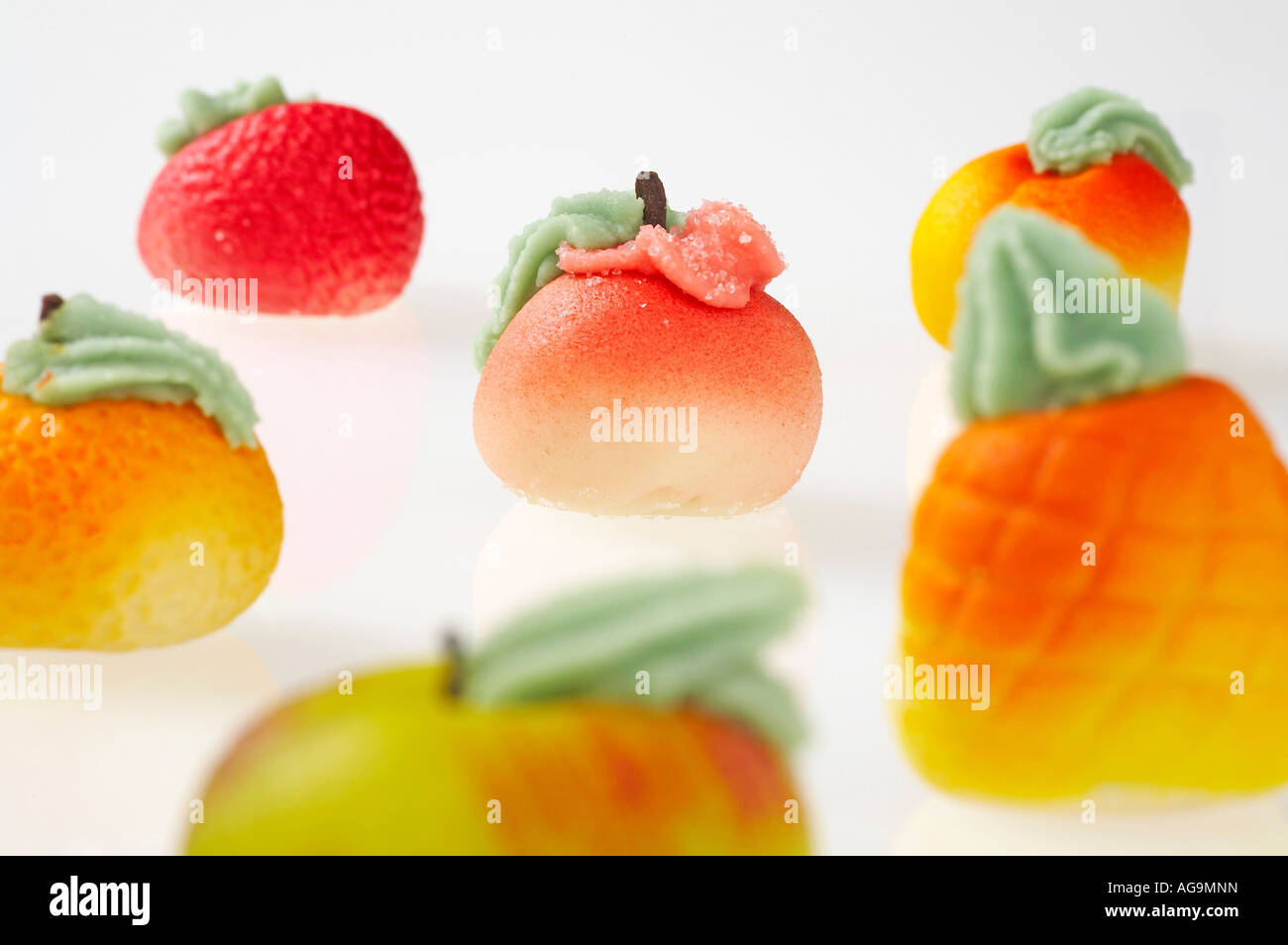 Marzipan on white surface Stock Photo - Alamy