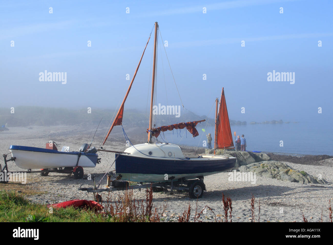 Misty blue morning light at Port Ban in Argyll Scotland Stock Photo - Alamy