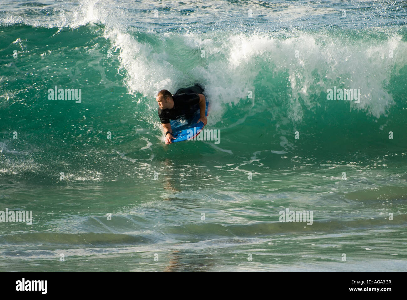 Surfers at Portreath Cornwall England Stock Photo - Alamy