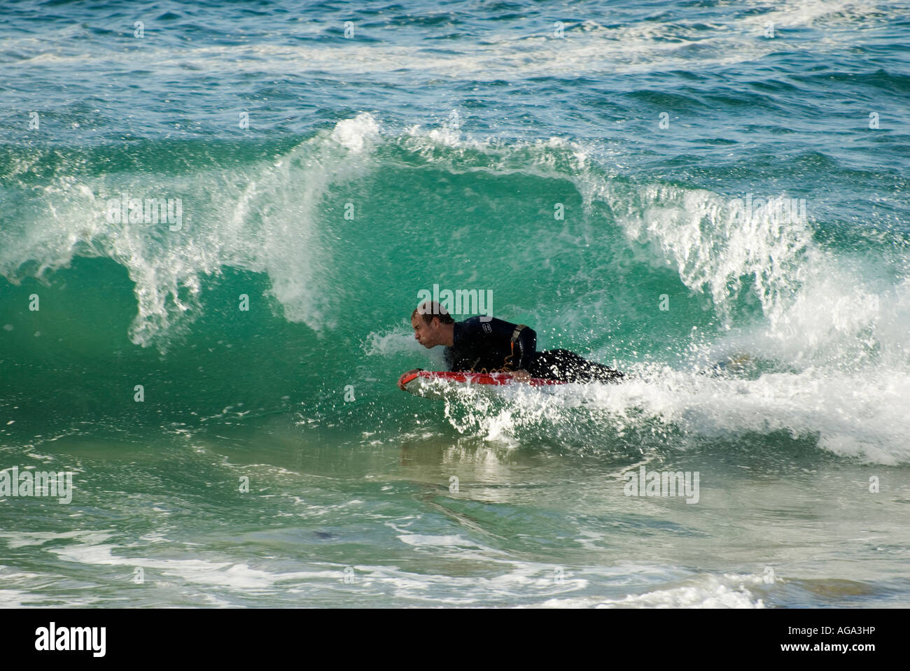 Surfers at Portreath Cornwall England Stock Photo - Alamy