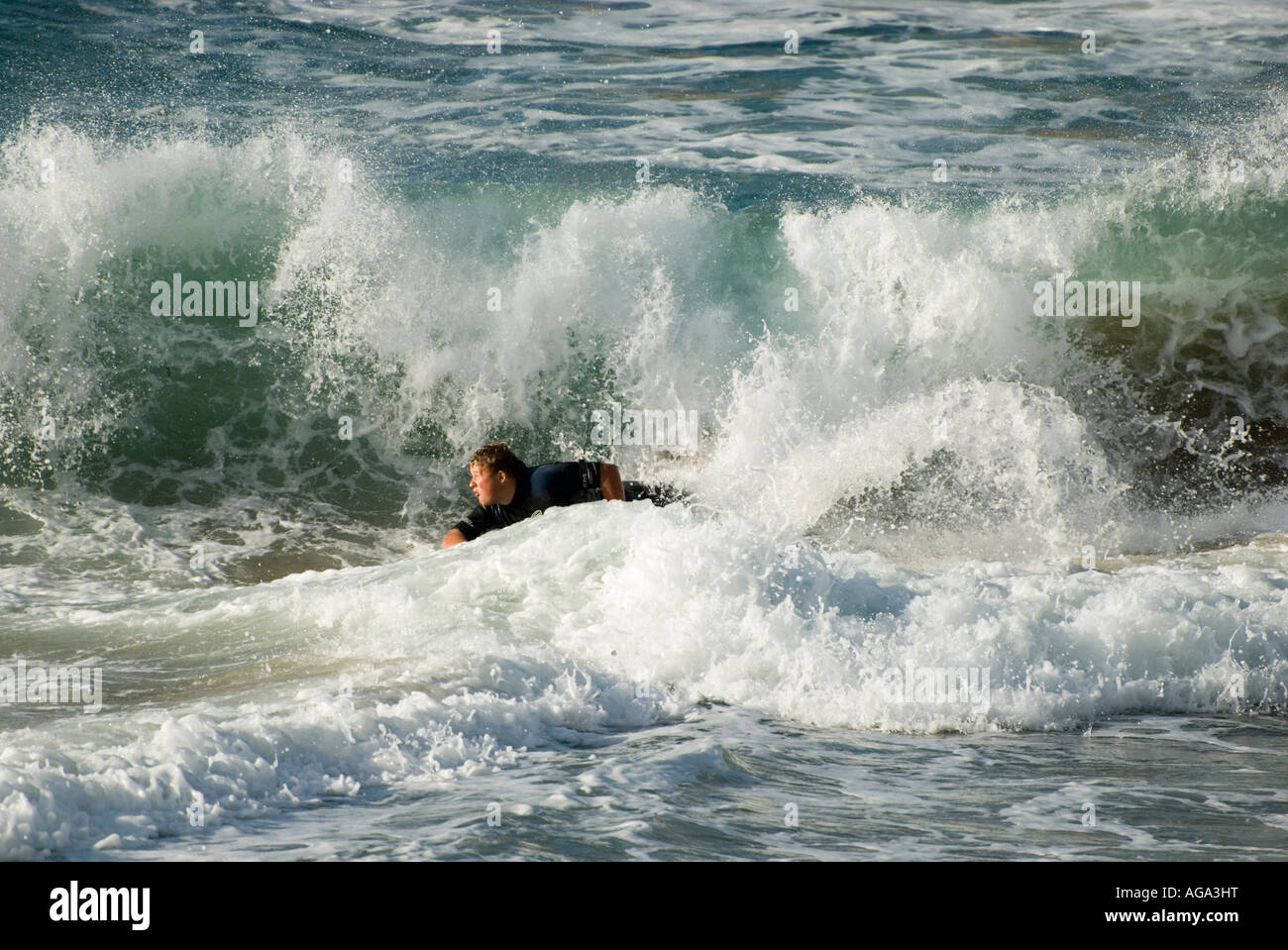 Surfers at Portreath Cornwall England Stock Photo - Alamy