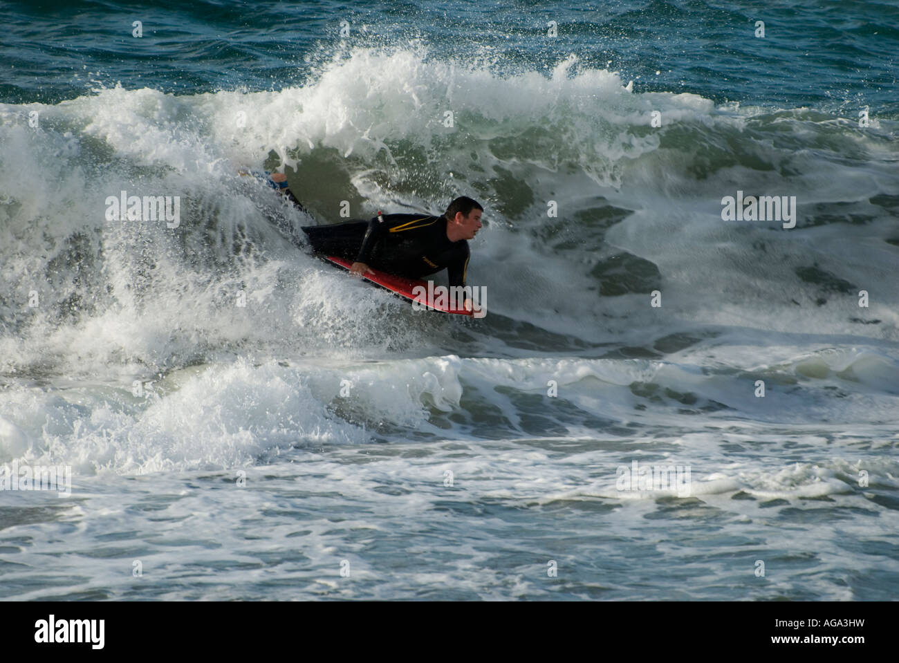 Surfers at Portreath Cornwall England Stock Photo - Alamy