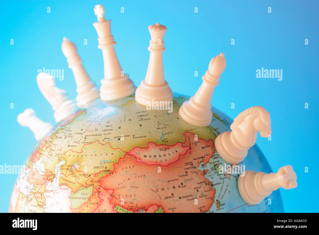 Chess pieces on globe hi-res stock photography and images - Alamy