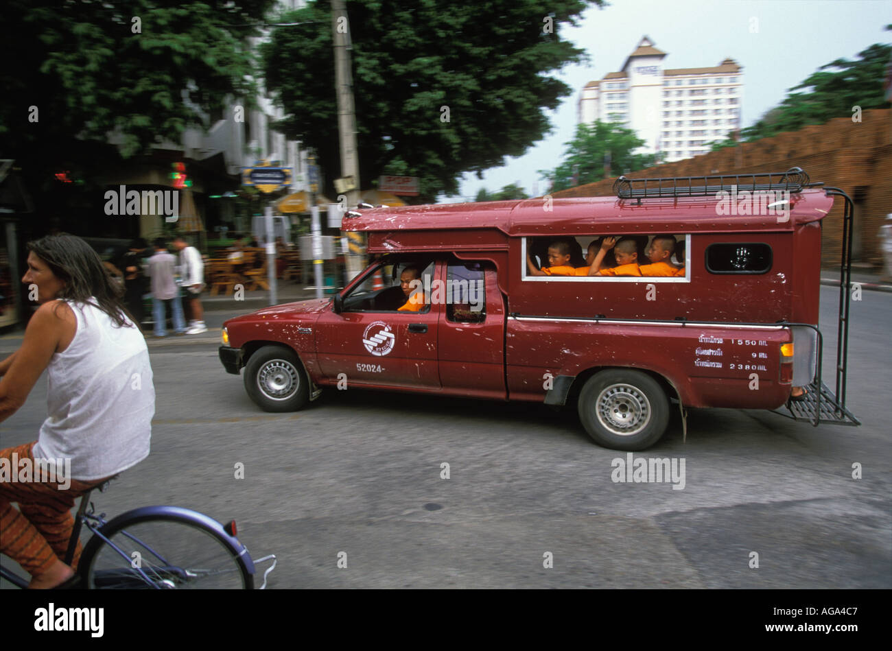 A songtaew a pickup converted into a taxi filled with young novice ...