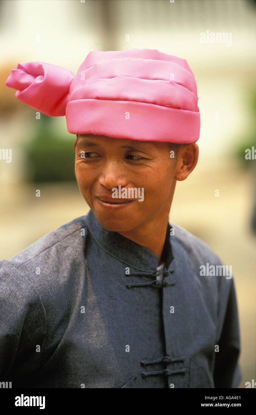 Young Shan man in traditional costume taking part in a procession at ...