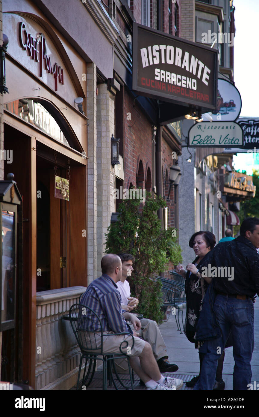 Family conversation on sidewalk in front of Cafe Pompei in Italian ...