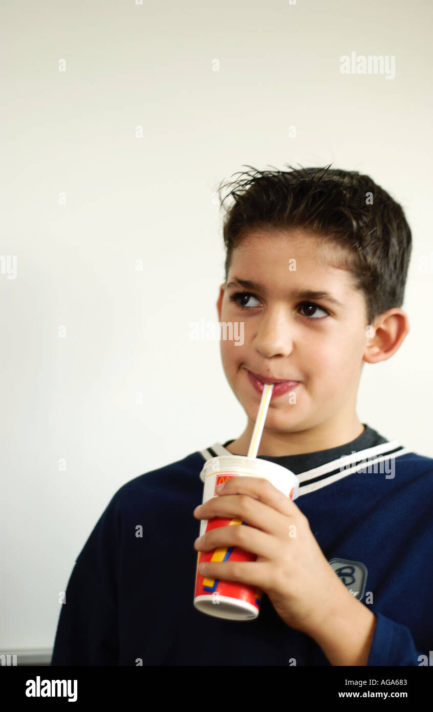 Boy child young drinking coke hi-res stock photography and images - Alamy