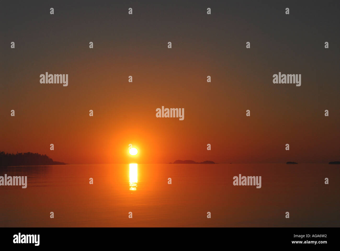 Michigan Isle Royale National Park sunset over Great Lakes Stock Photo ...