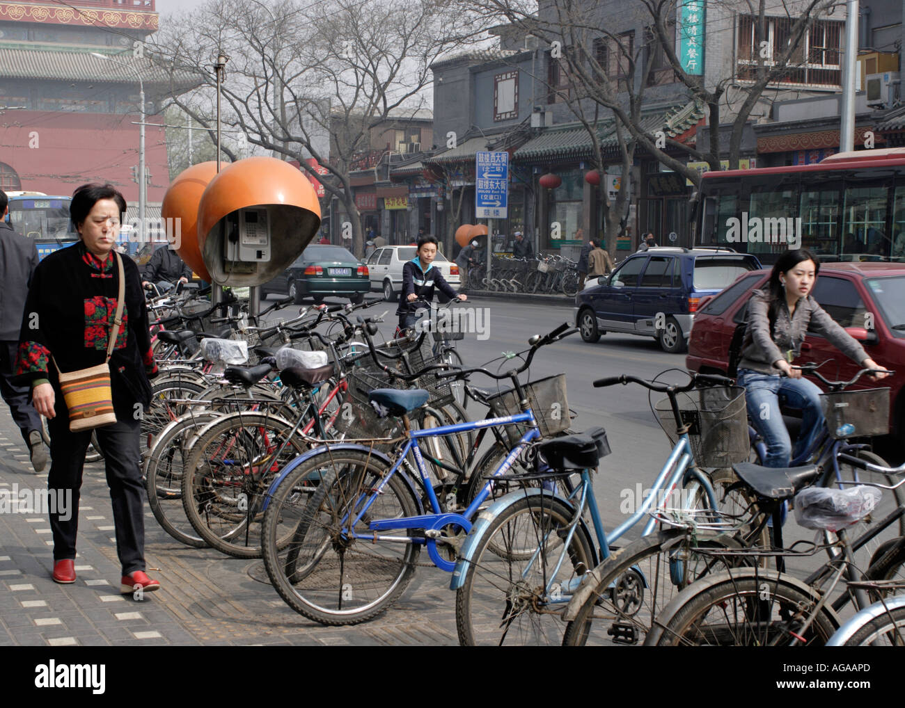 Bicycles pedestrians and traffic in Beijing China Stock Photo - Alamy