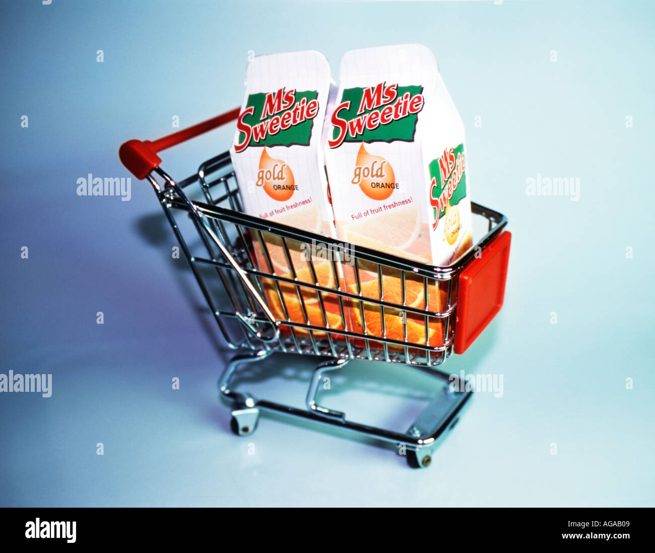 mini caddie with two mini carton of orange juice Stock Photo - Alamy
