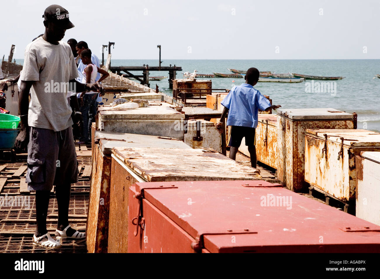 Fish containers on the beach at Bakau, The Gambia, Africa Stock Photo ...