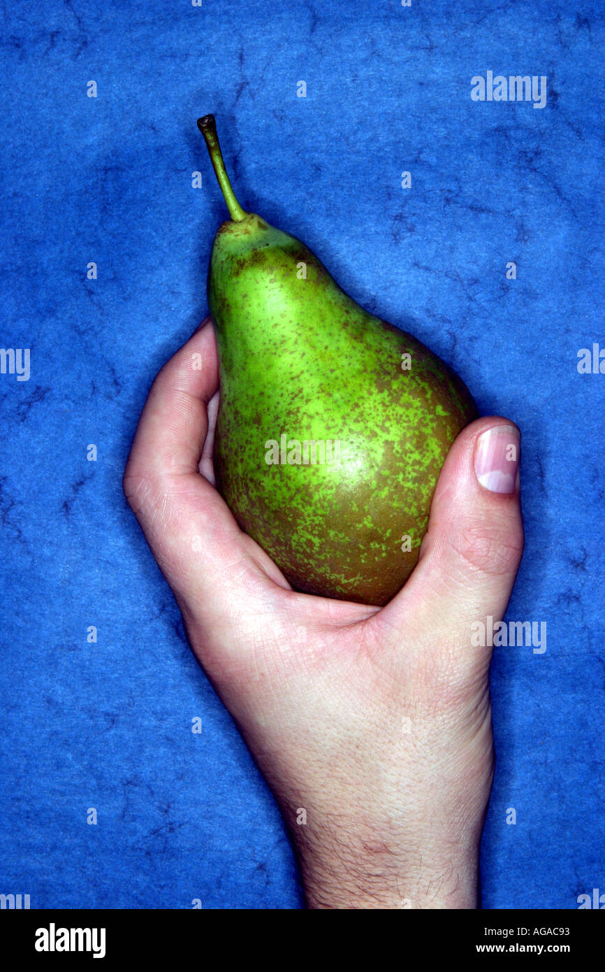 Hand give pear hi-res stock photography and images - Alamy