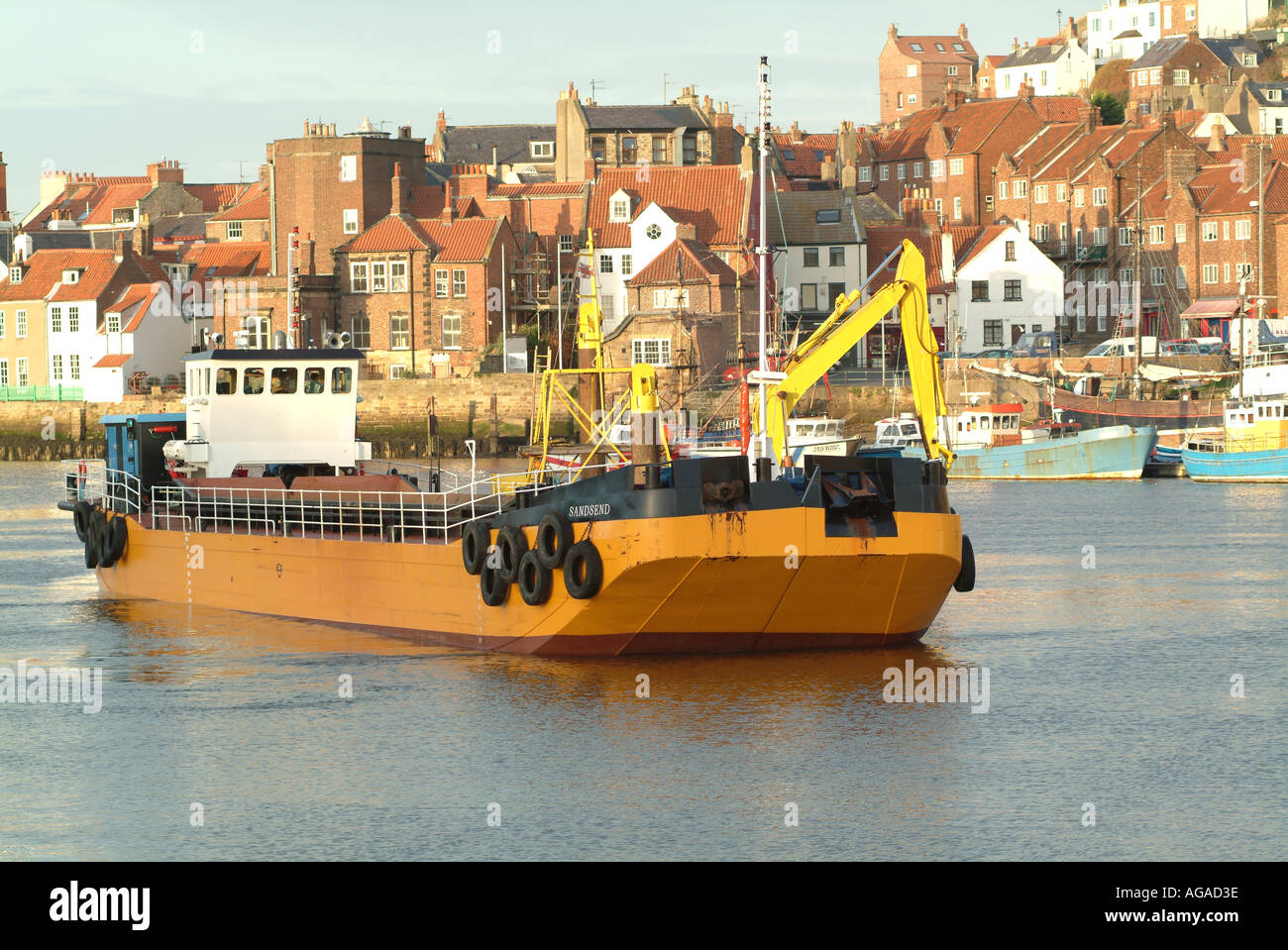 Dredger and Fishing Boats at Whitby Harbour North Yorkshire England ...