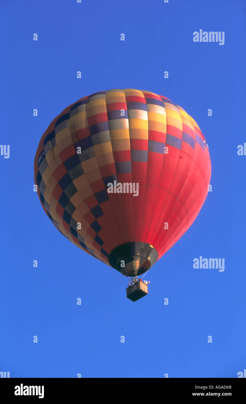 Red balloon floating away hi-res stock photography and images - Alamy