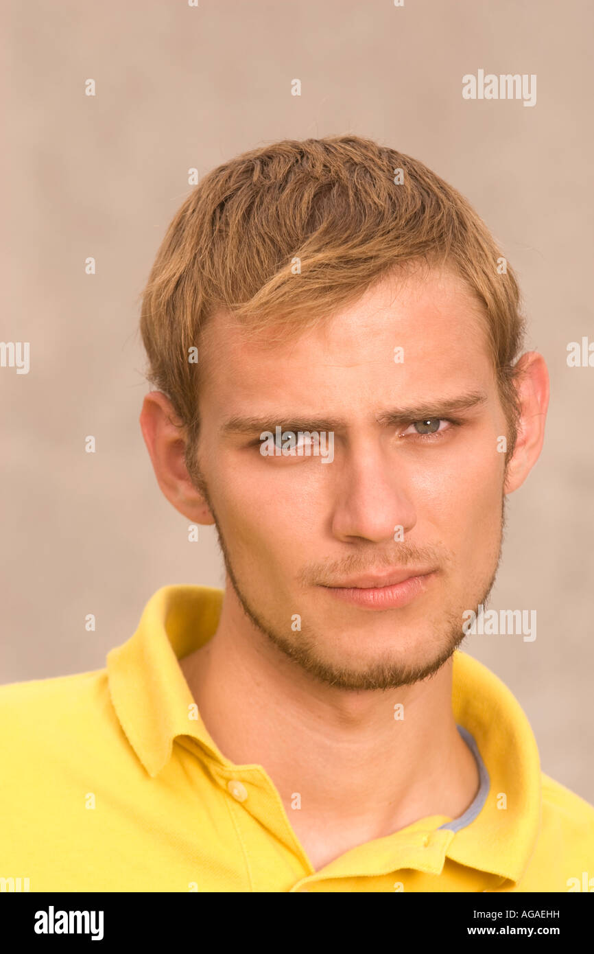 headshot of determined looking young man Stock Photo - Alamy