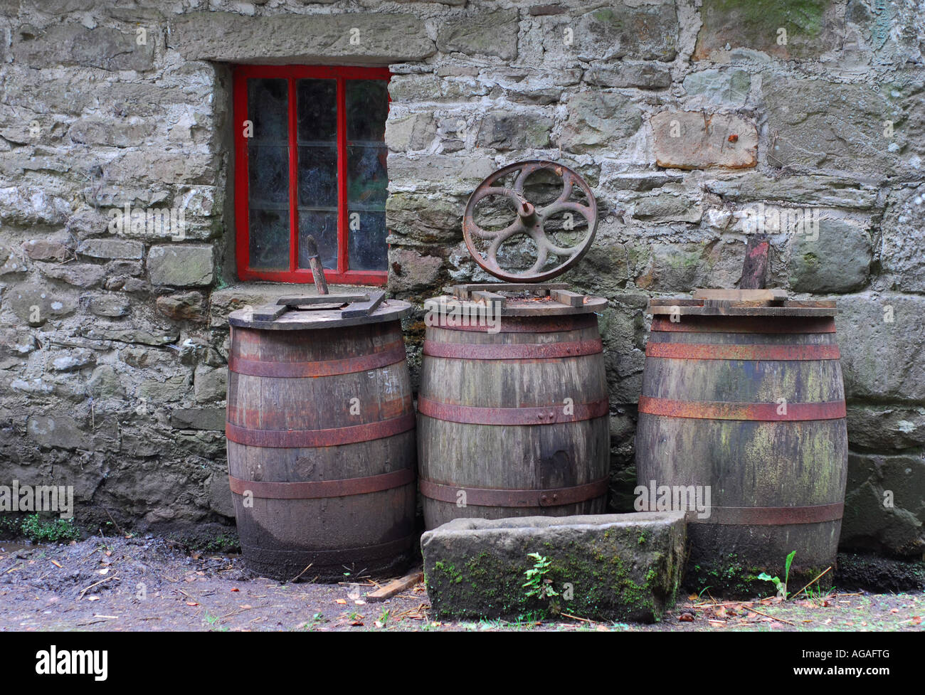 Cottage with barrels Stock Photo - Alamy