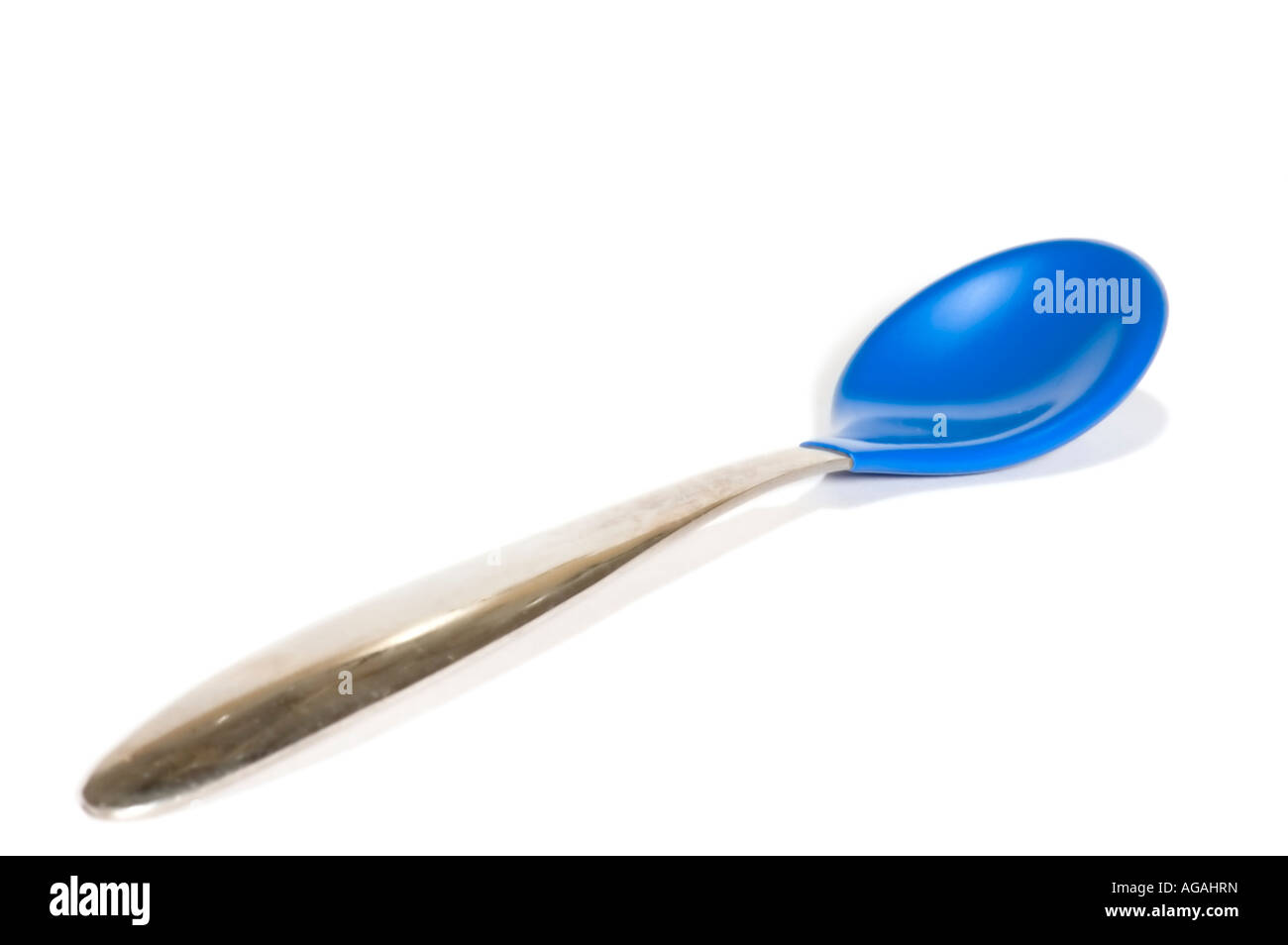 series object on white spoon for child Stock Photo - Alamy