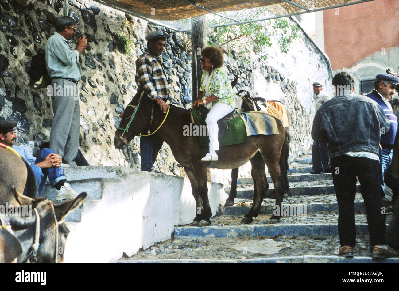 Donkey carrying tourist hi-res stock photography and images - Alamy