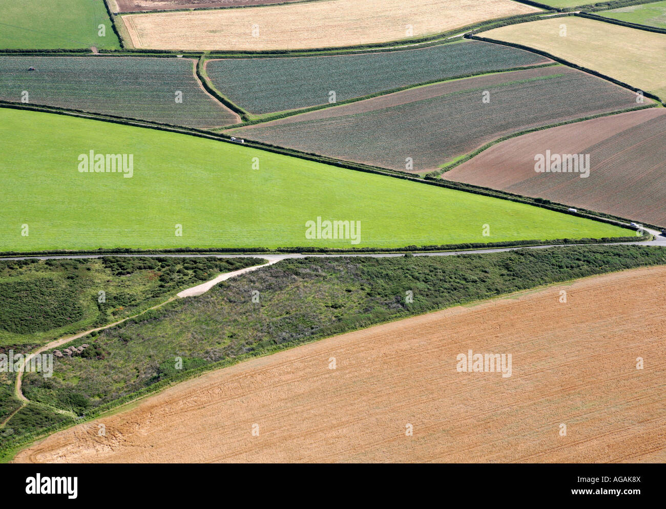 Aerial of cultivated fields near Hell's Mouth, Cornwall, UK Stock Photo ...