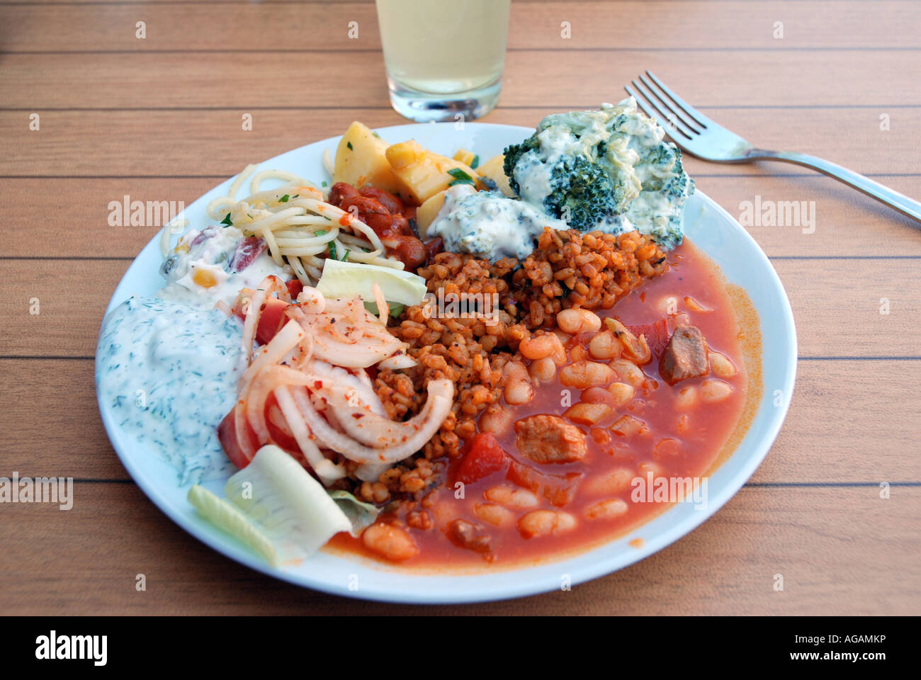 Plate full of food in Turkey, onion, potato, been with meat, broccoli ...