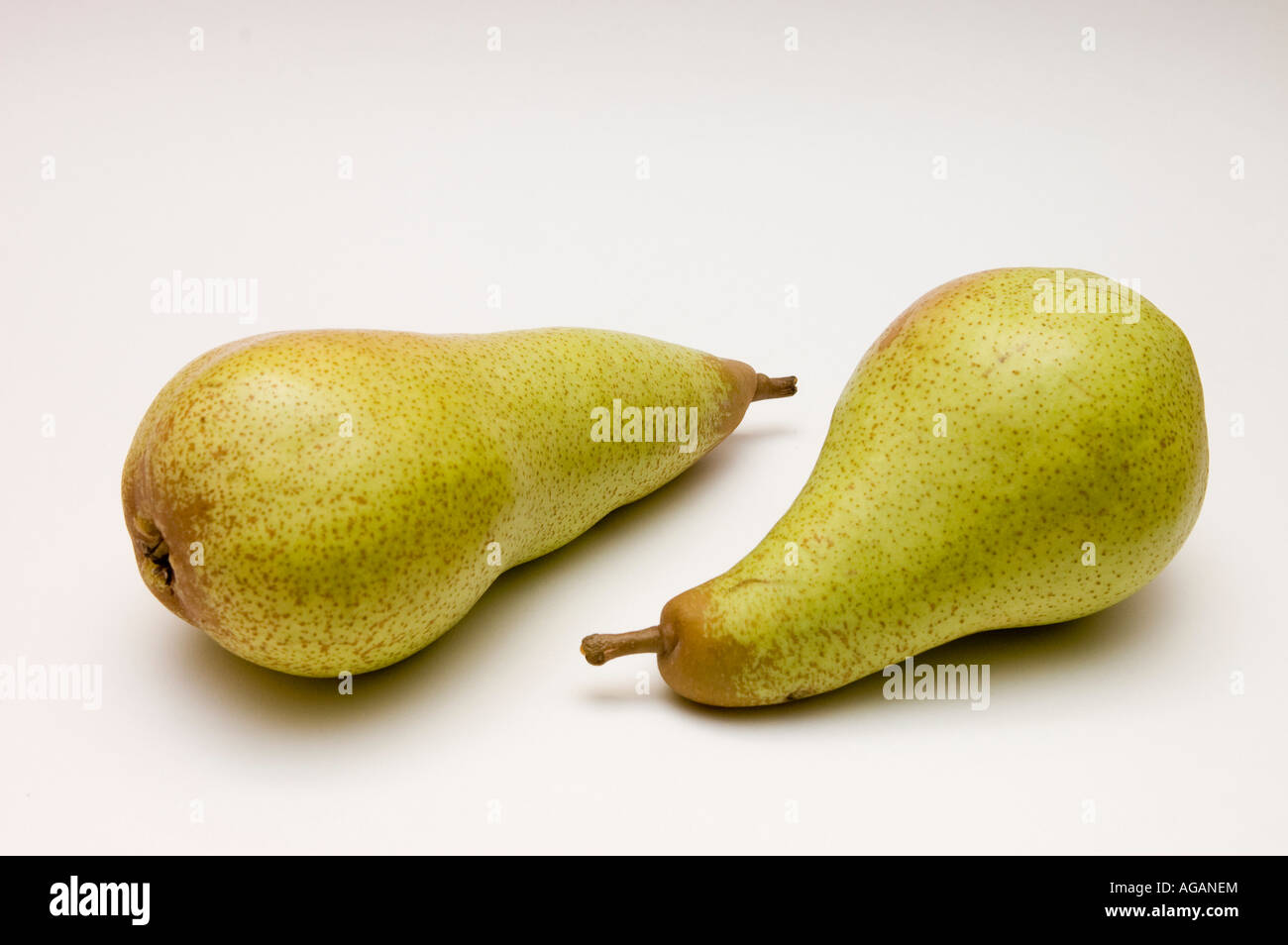 fruits two green pears on white background Stock Photo - Alamy