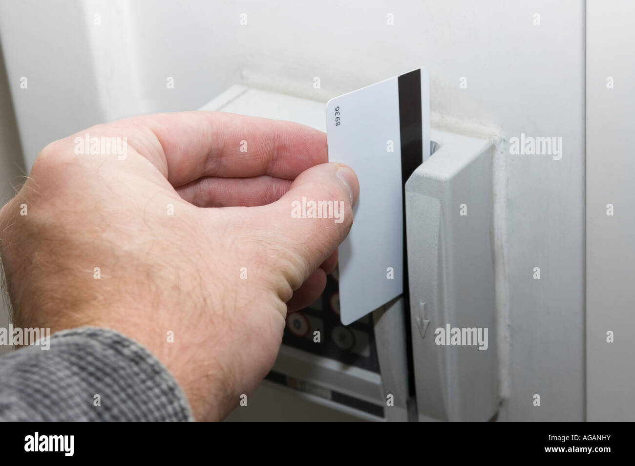 hand holding key card and opening door Stock Photo - Alamy