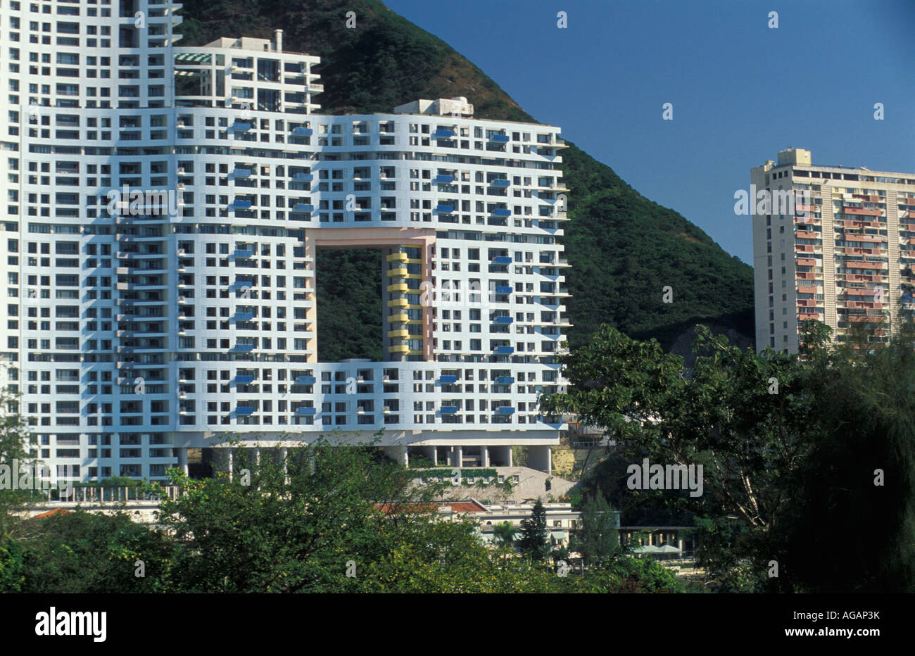 China, Hong Kong, Gap in building to make space for dragon Stock Photo ...