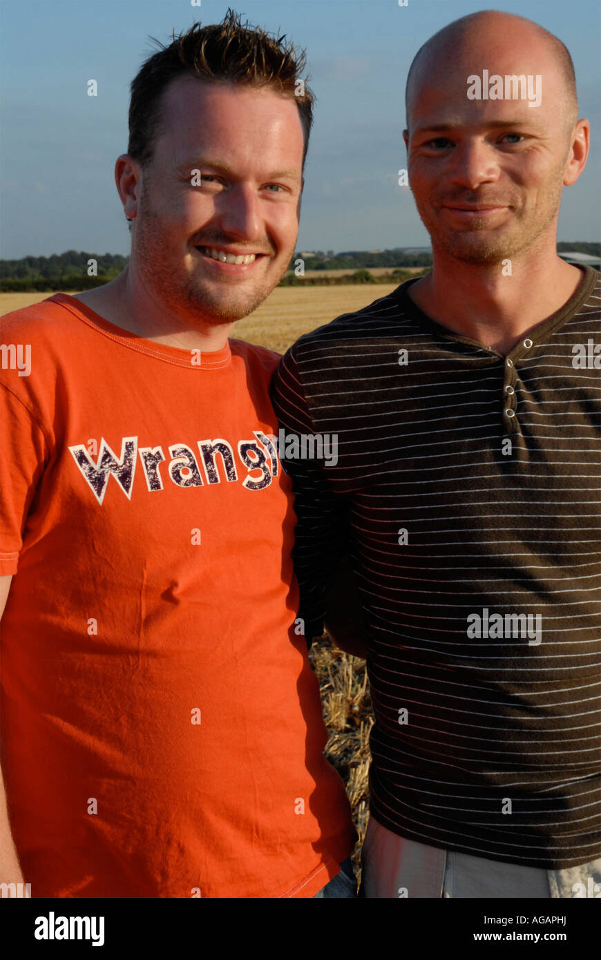 Portrait of two men standing together Stock Photo - Alamy
