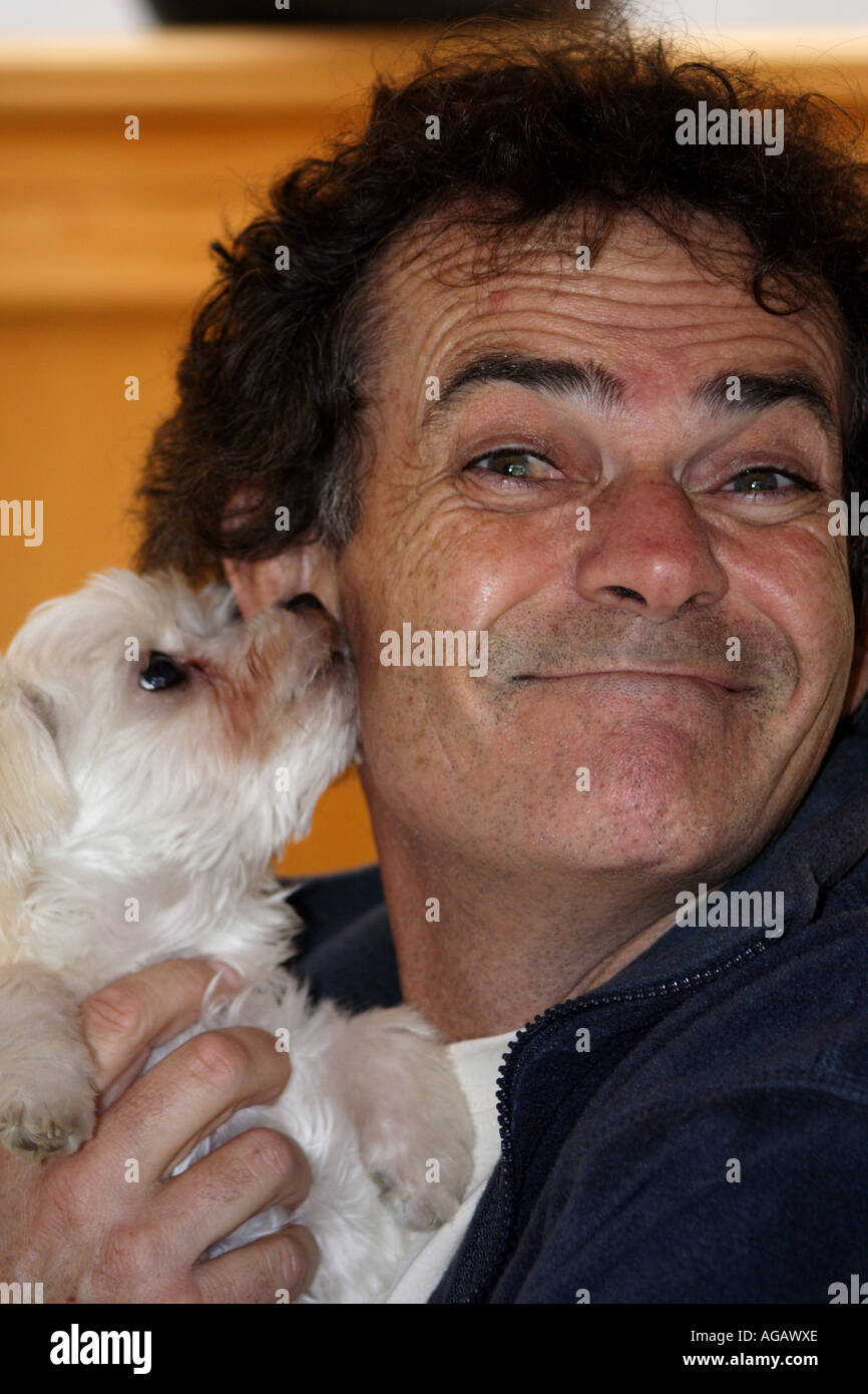 Dog biting ear hi-res stock photography and images - Alamy