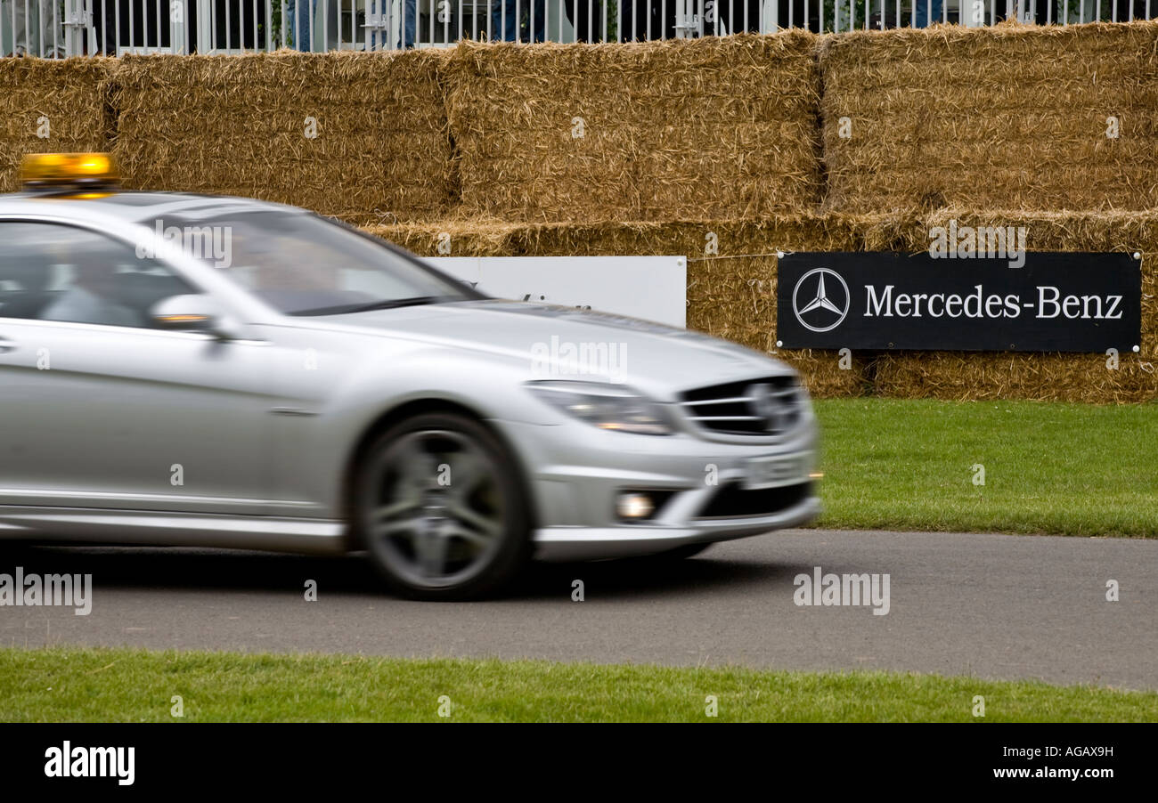 The Mercedes-Benz course car makes its way up the hillclimb at Goodwood ...