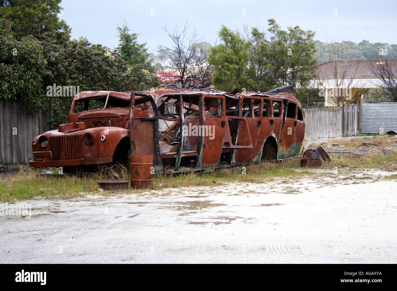 FRONT SIDE VIEW BURNT OUT RUSTY OLD BUS HORIZONTAL BAPDA8859 Stock ...