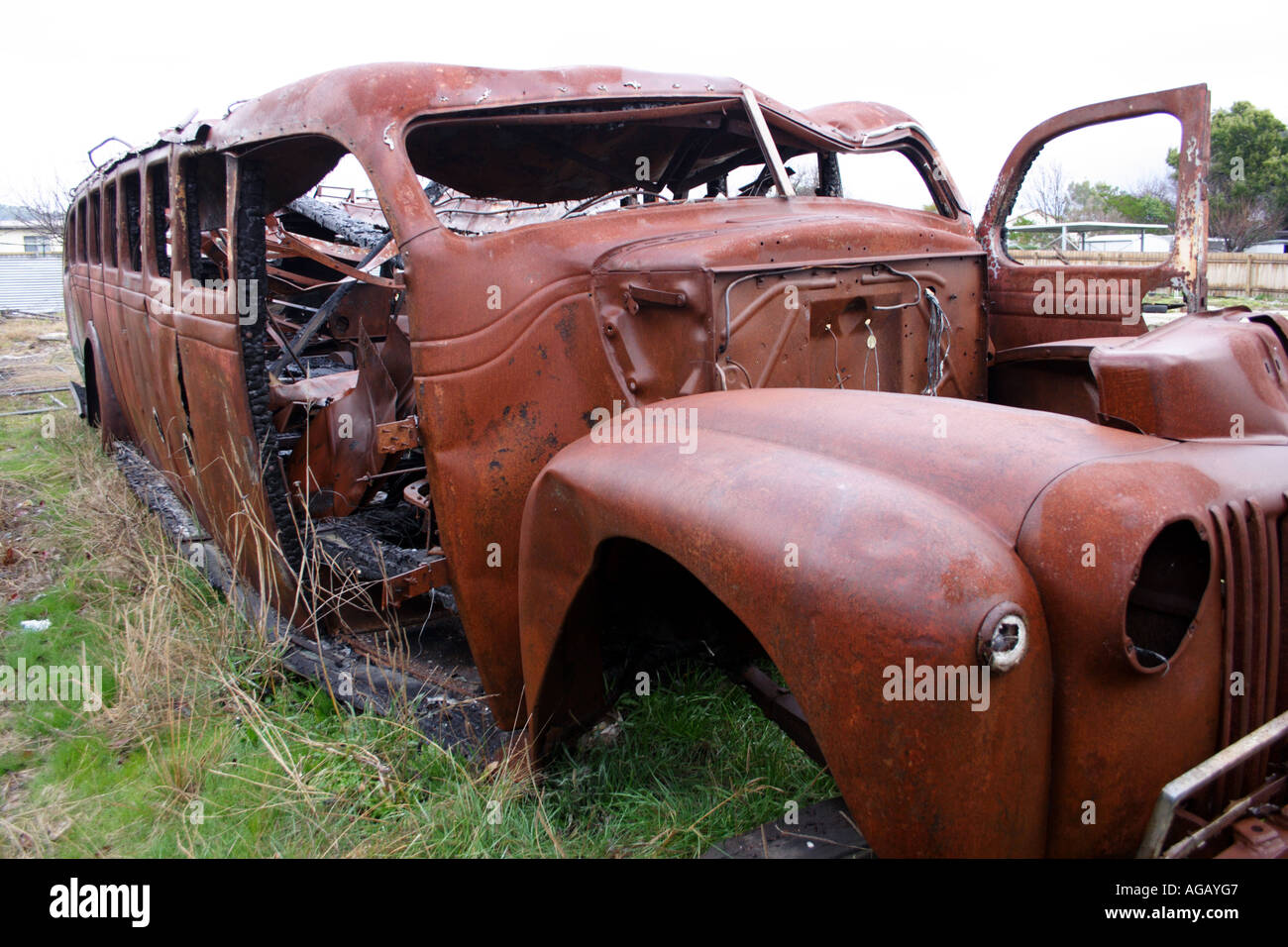 BURNT OUT RUSTY OLD BUS HORIZONTAL BAPDA8864 Stock Photo - Alamy